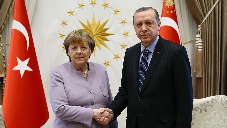 Merkel pledges to Turkey's Erdogan sped-up refugee aid