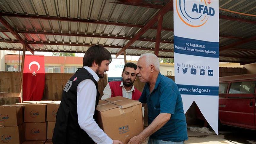 Turkish group gives food aid to Iraqi Turkmens in Erbil