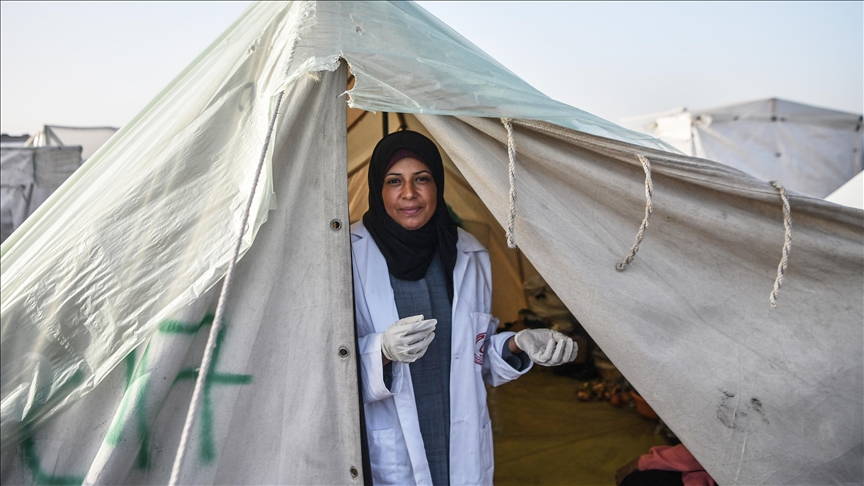 Displaced Palestinian doctor provides medical care in tent in southern Gaza