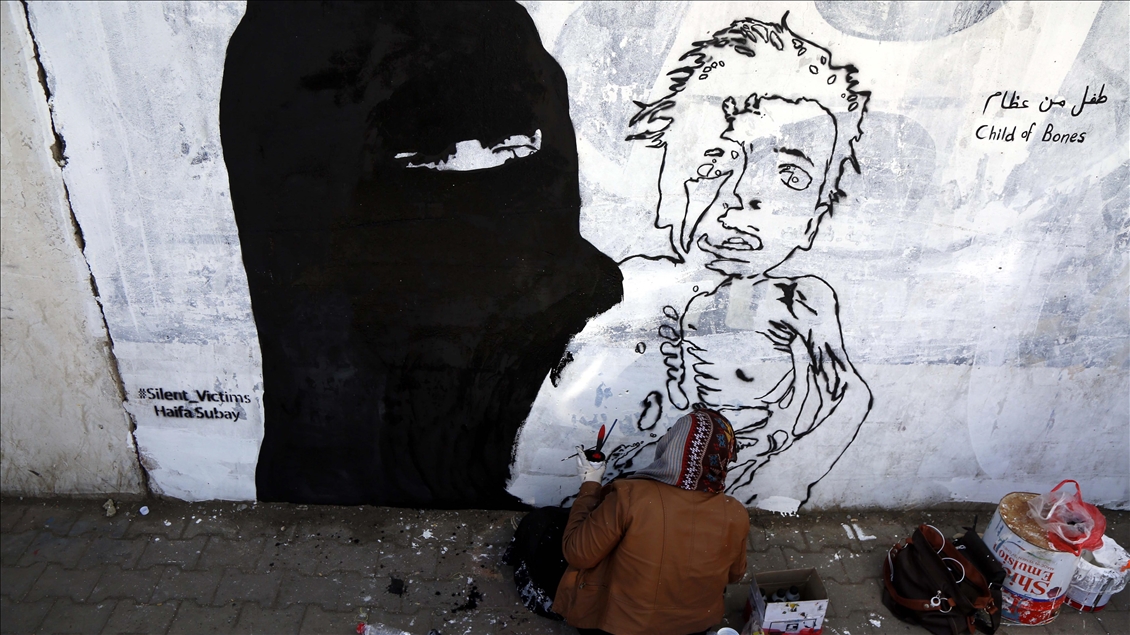 Yemeni street artist Haifa Subay's graffitis in Sanaa - Anadolu Ajansı