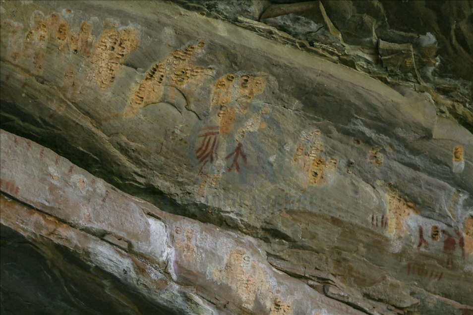 Indigenous pictographs art is hidden at the top of the Mogoticos river ...