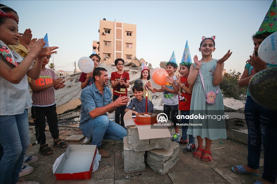 Palestinian child's birthday celebrated near debris of former house ...