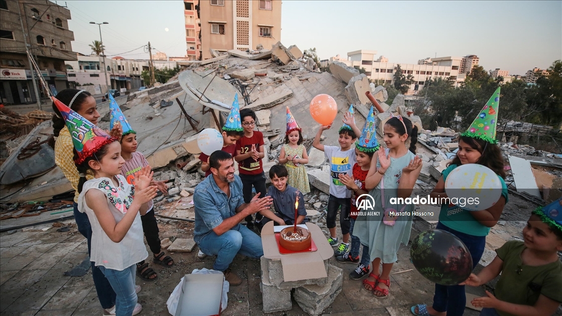 Palestinian child's birthday celebrated near debris of former house ...