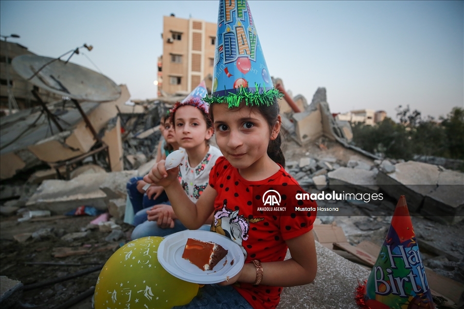 Palestinian child's birthday celebrated near debris of former house ...