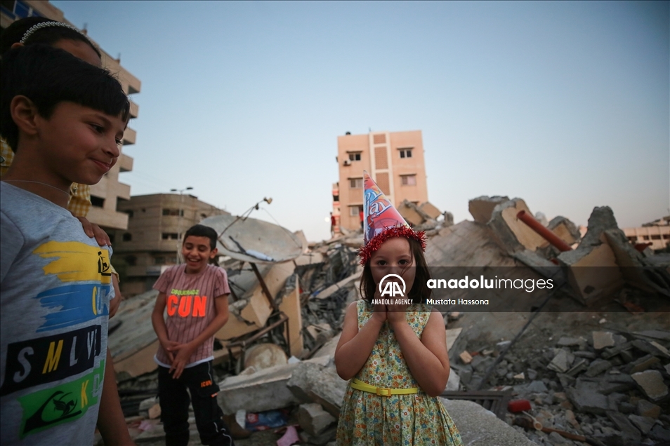 Palestinian child's birthday celebrated near debris of former house ...