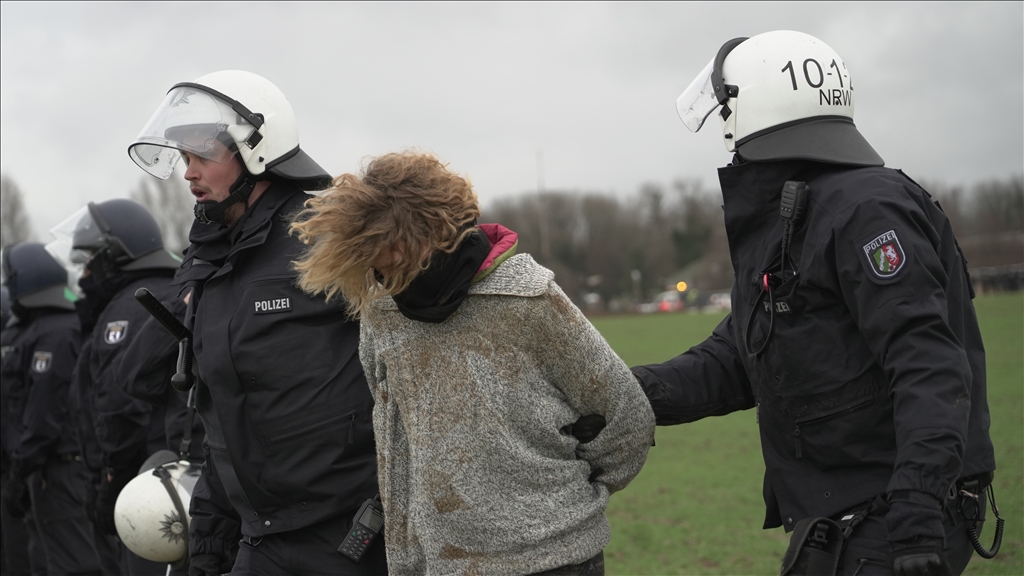 German authorities starts to clear a major protest camp in the village ...