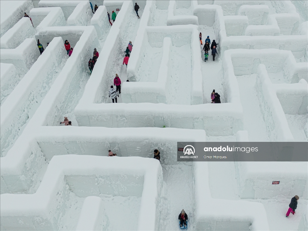 People try to find their way out from a maze in Poland's famous ...