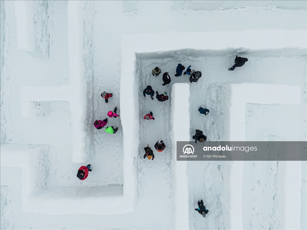 People try to find their way out from a maze in Poland's famous ...