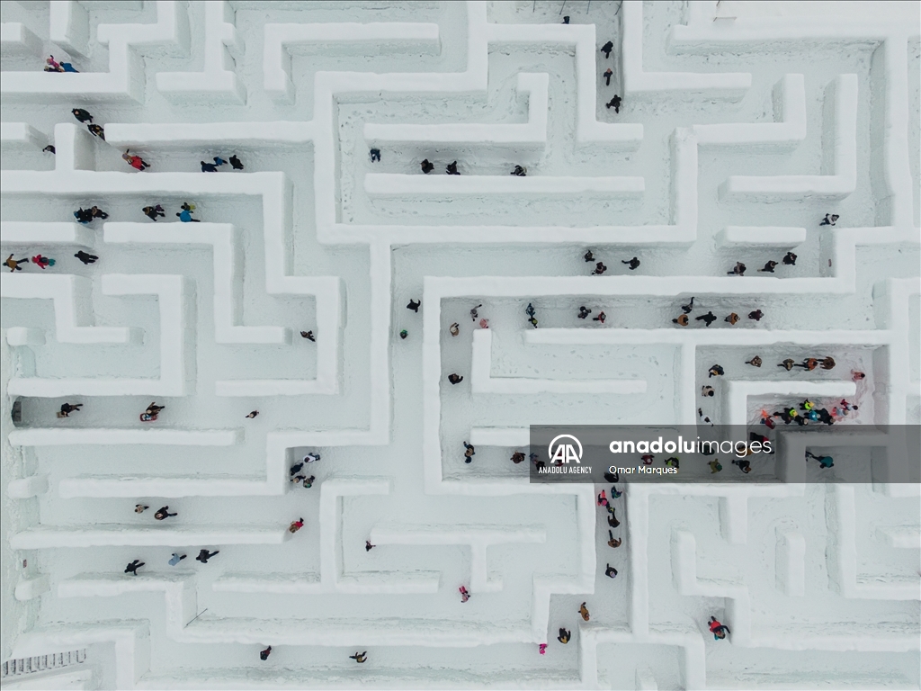 People try to find their way out from a maze in Poland's famous ...