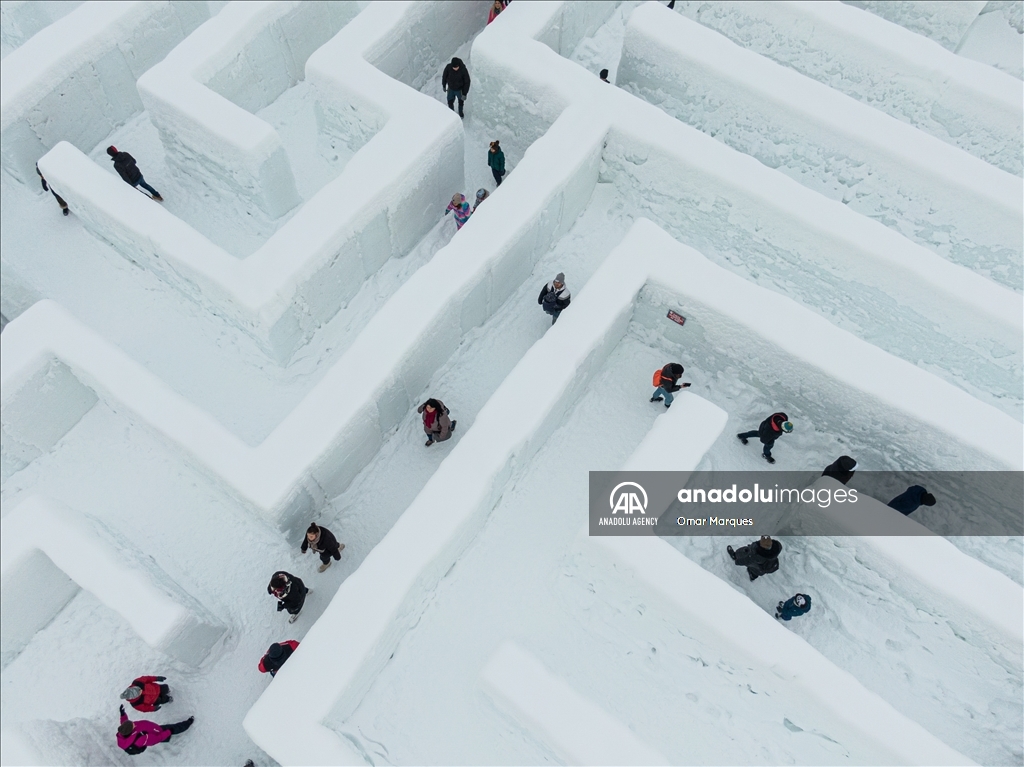 People try to find their way out from a maze in Poland's famous ...
