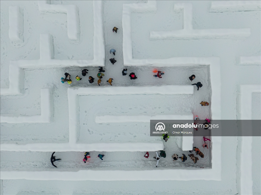 People try to find their way out from a maze in Poland's famous ...