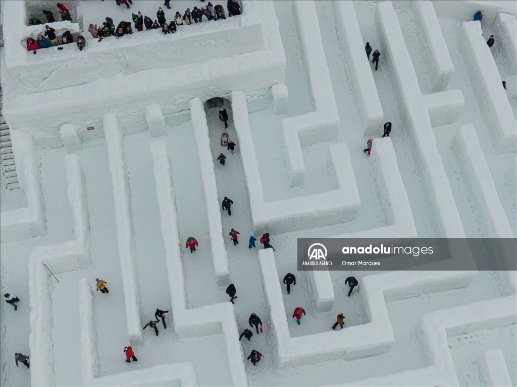 People try to find their way out from a maze in Poland's famous ...