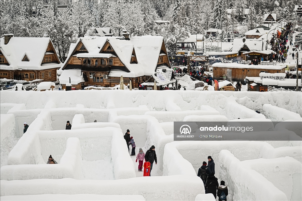 People try to find their way out from a maze in Poland's famous ...