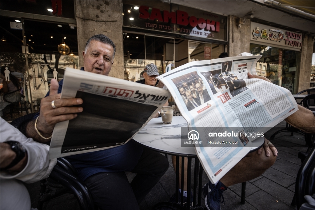 Black front pages of newspapers after law draft of judicial regulation is approved by the ...