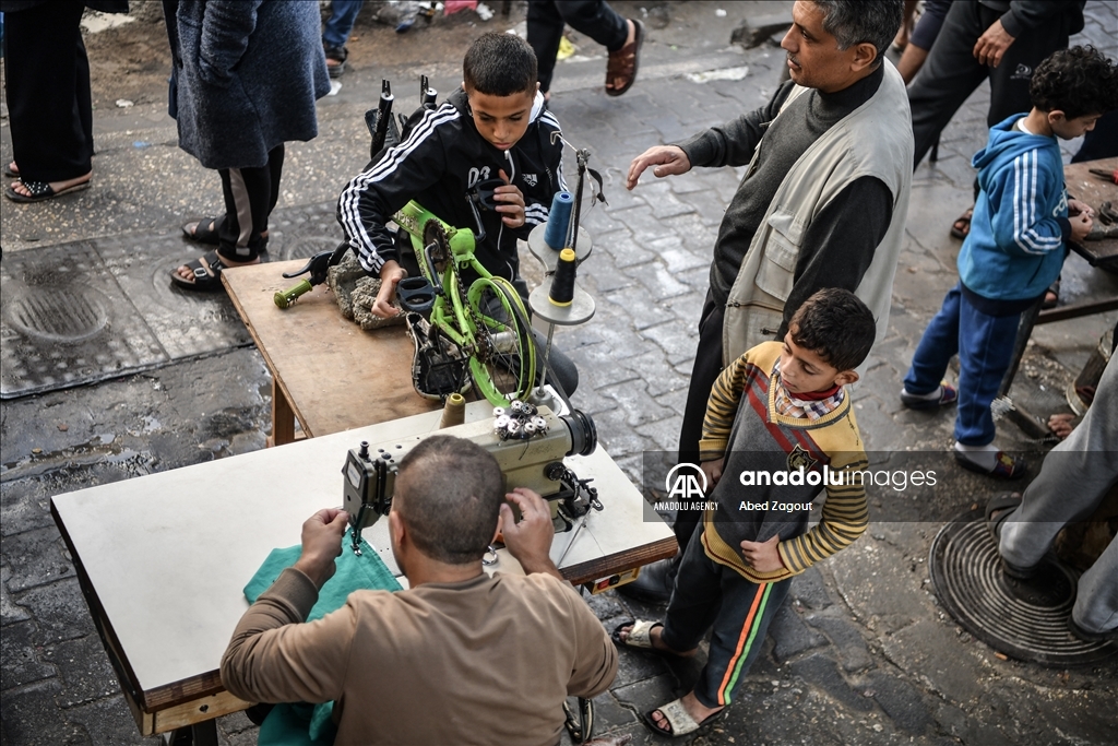 Palestinian tailor develops his own version of treadle sewing machine ...
