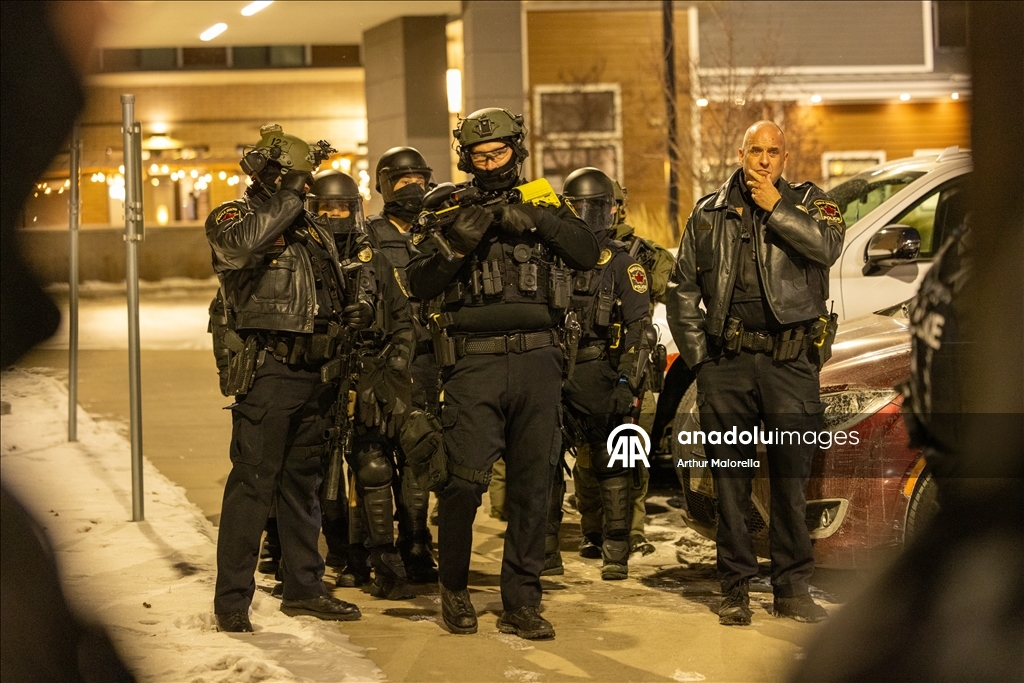 Protesters hold demonstration in front of a hotel believed to be ...