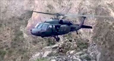 Turkish military helicopter evacuates soldiers, touching one wheel on ...