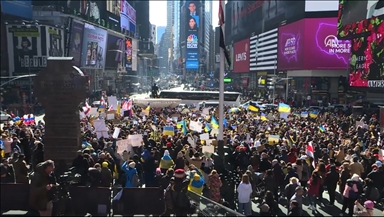 Hundreds gather in New York Times Square to show their support for ...