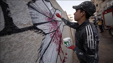 Syrian artists express 14 years of revolution through graffiti in ...